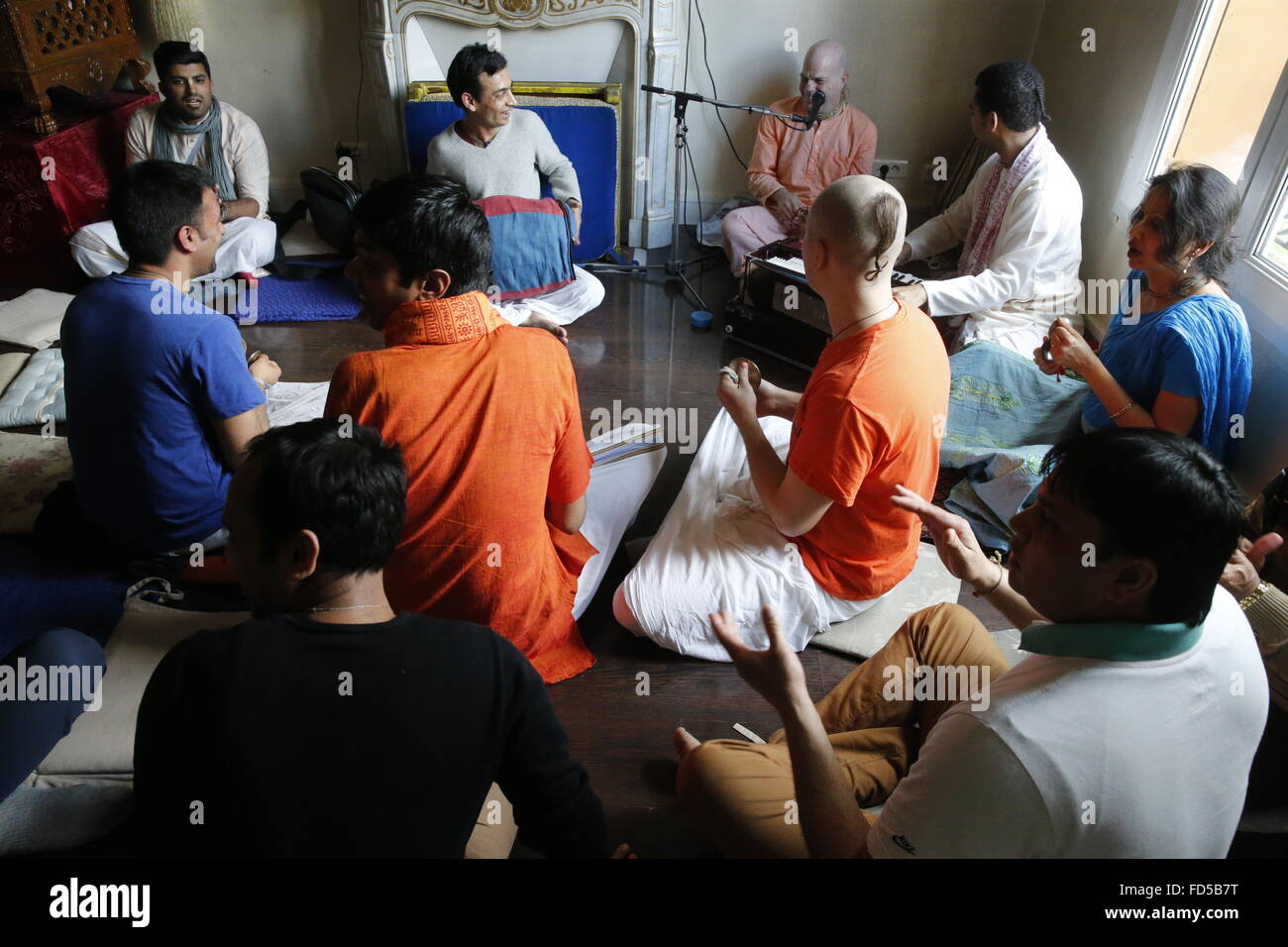 Devotees chanting kirtans in the Sarcelles ISKCON temple Stock Photo ...
