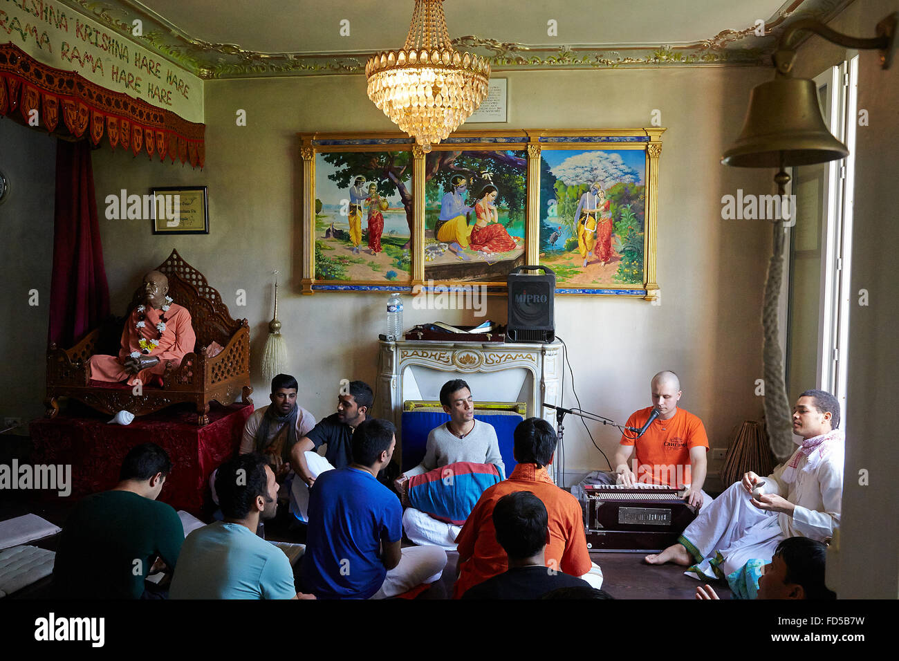 Devotees chanting kirtans in the Sarcelles ISKCON temple Stock Photo ...