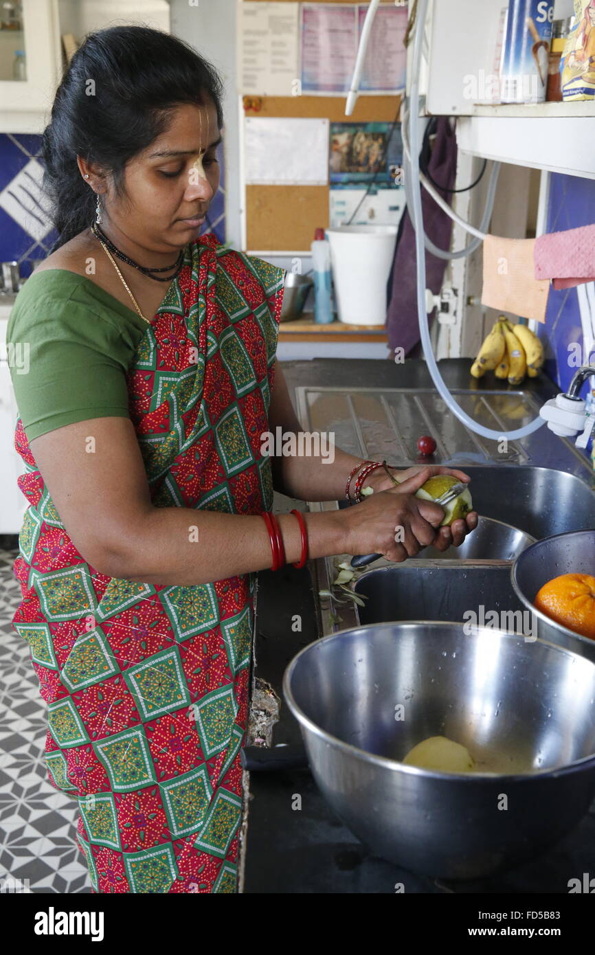 Devotee cooking in the Sarcelles ISKCON temple kitchen Stock Photo - Alamy