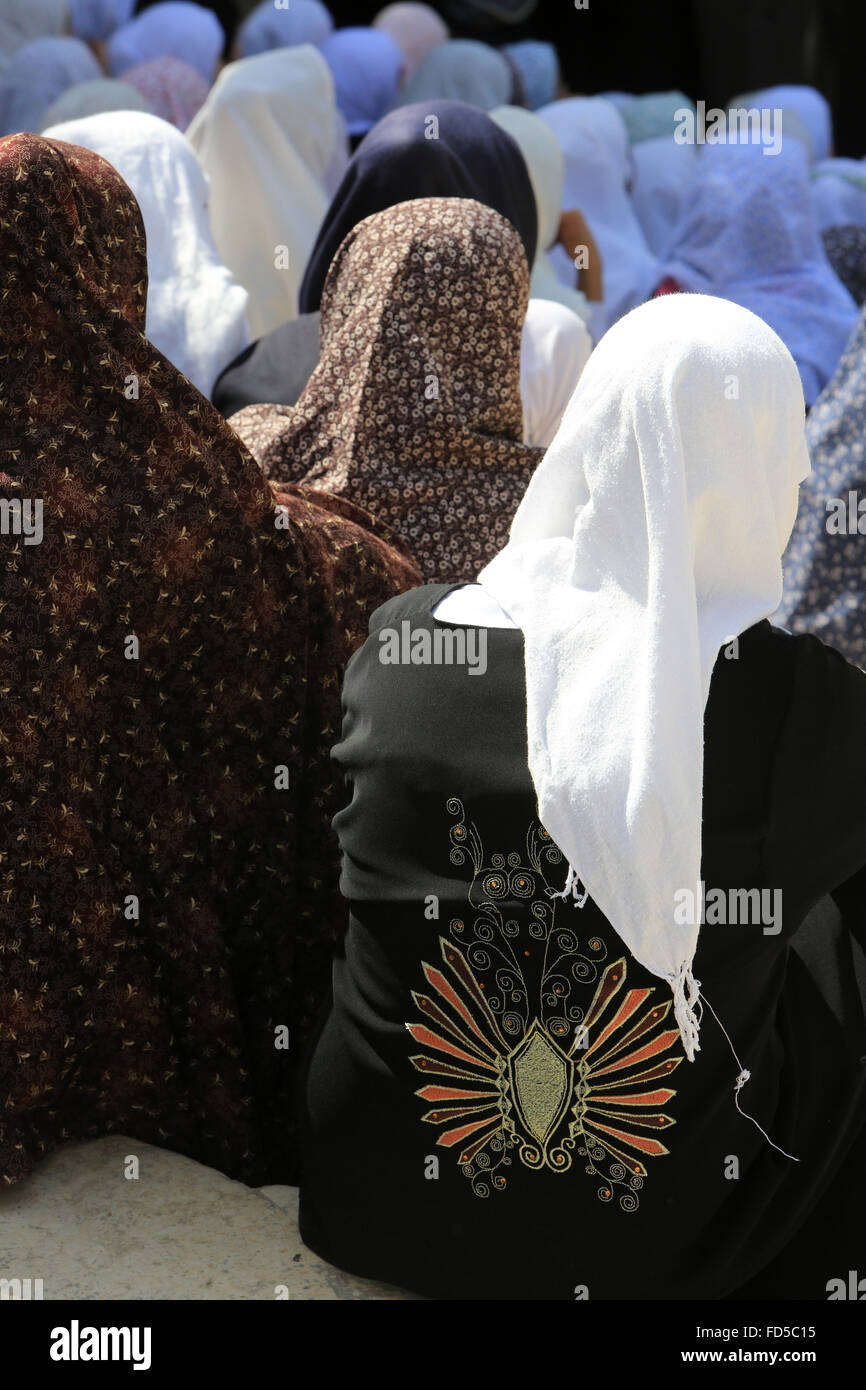 Muslim women sitting on a staircase of the Temple Mount Stock Photo - Alamy