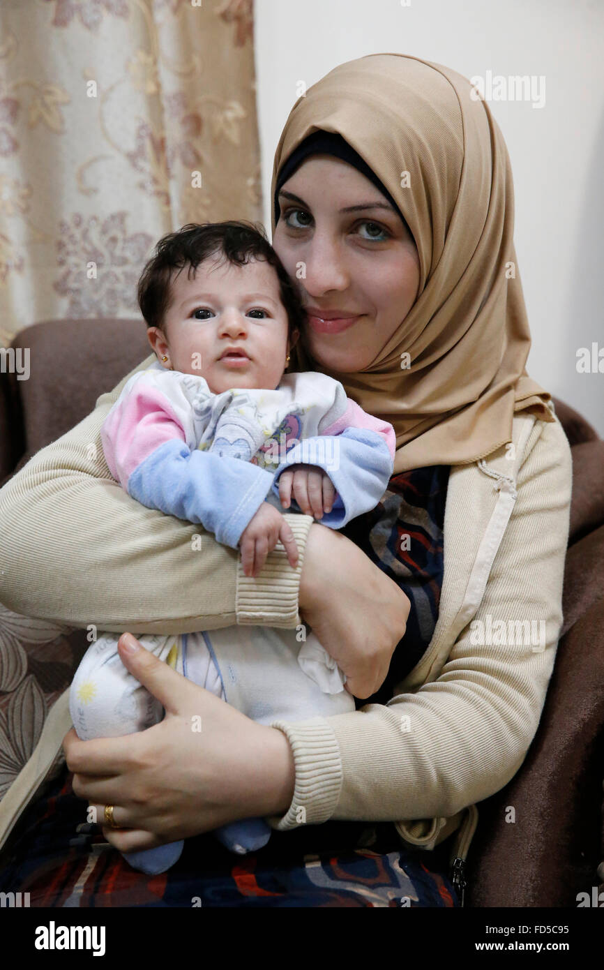 Palestinian mother and daughter at home in Tulkarem, West Bank Stock ...