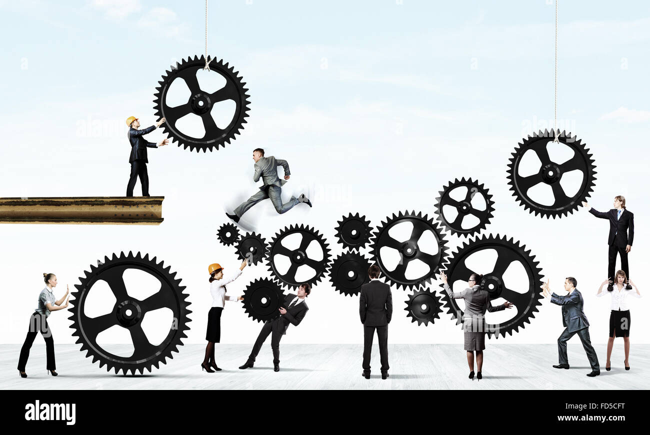 Conceptual image of businessteam working cohesively. Interaction and ...