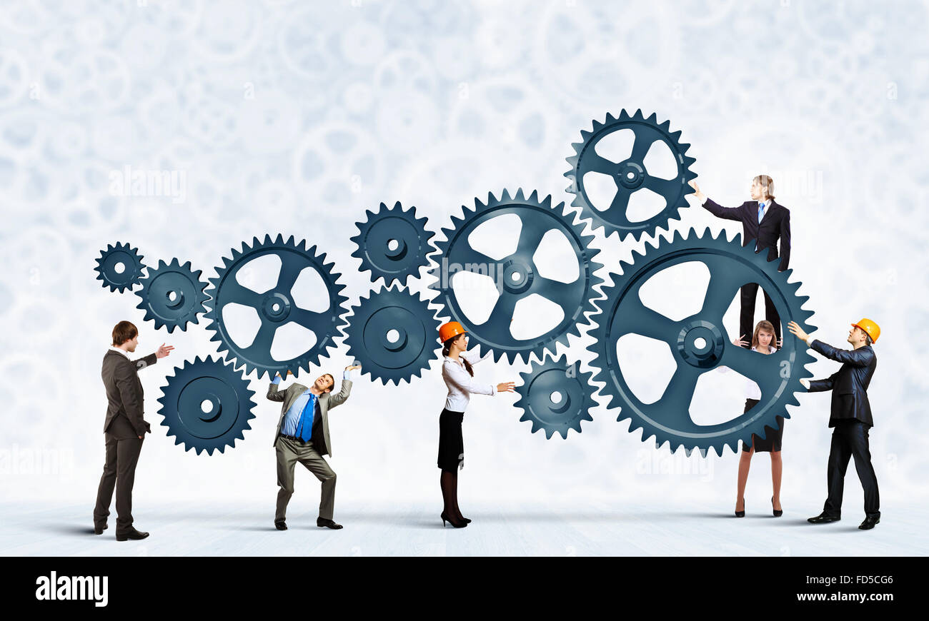 Conceptual image of businessteam working cohesively. Interaction and ...