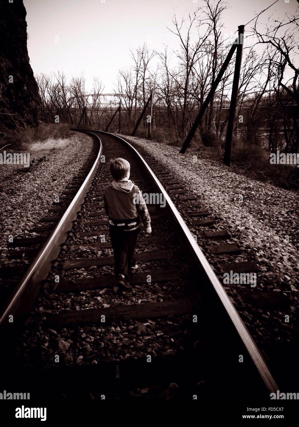 Boy on railroad track hi-res stock photography and images - Alamy