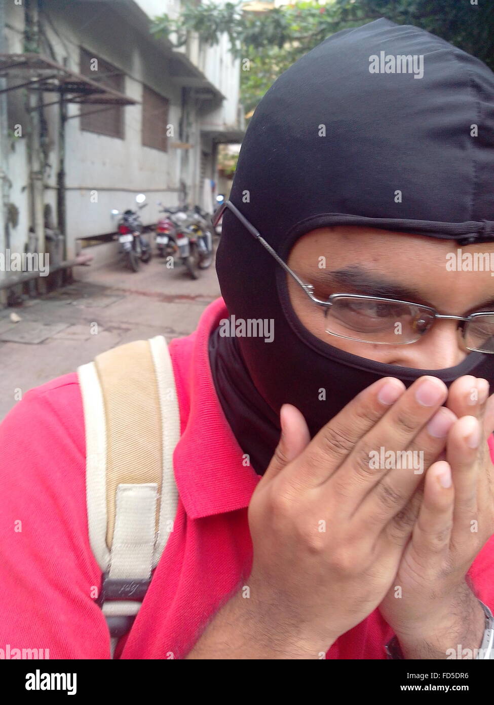 Gangster wearing mask hi-res stock photography and images - Alamy
