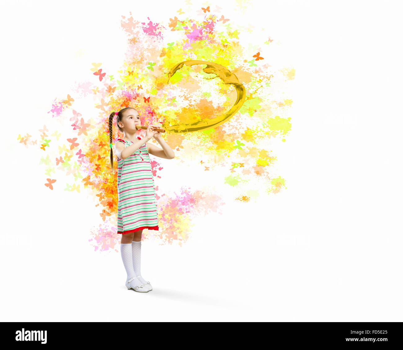 Image of little cute girl playing on flute Stock Photo - Alamy