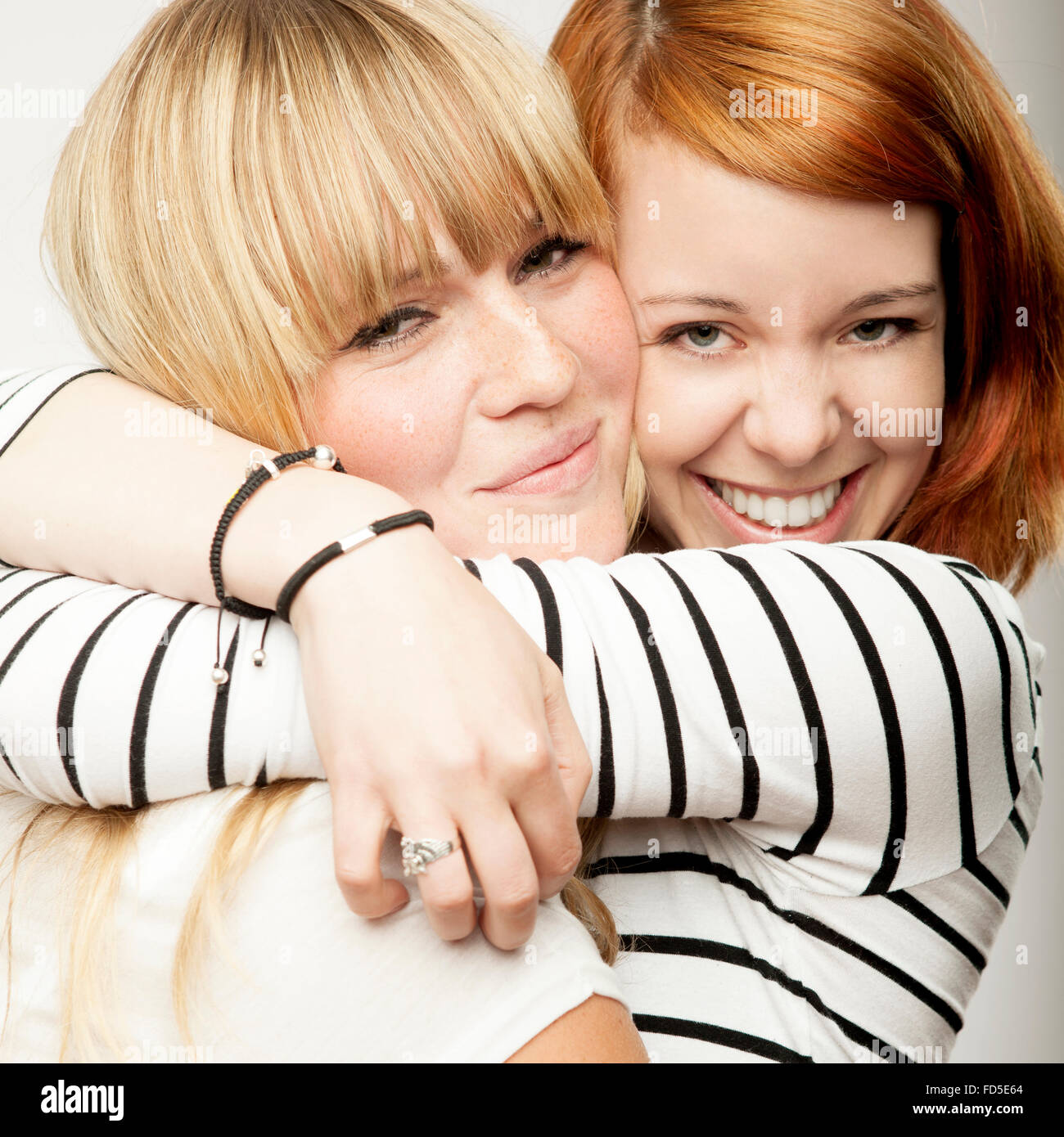 Blond teen couple hug together hi-res stock photography and images - Alamy