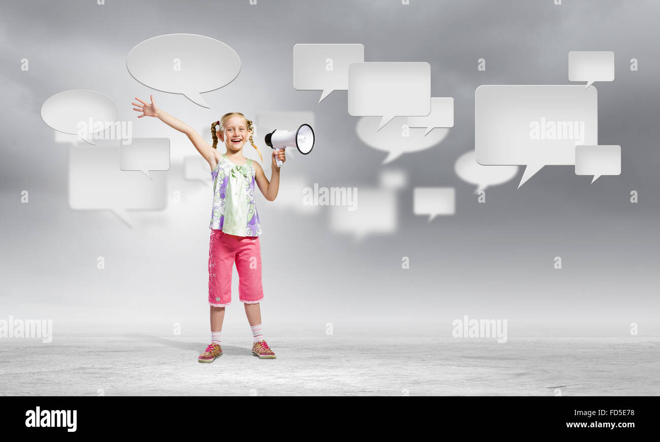 Image of little girl shouting into megaphone Stock Photo - Alamy
