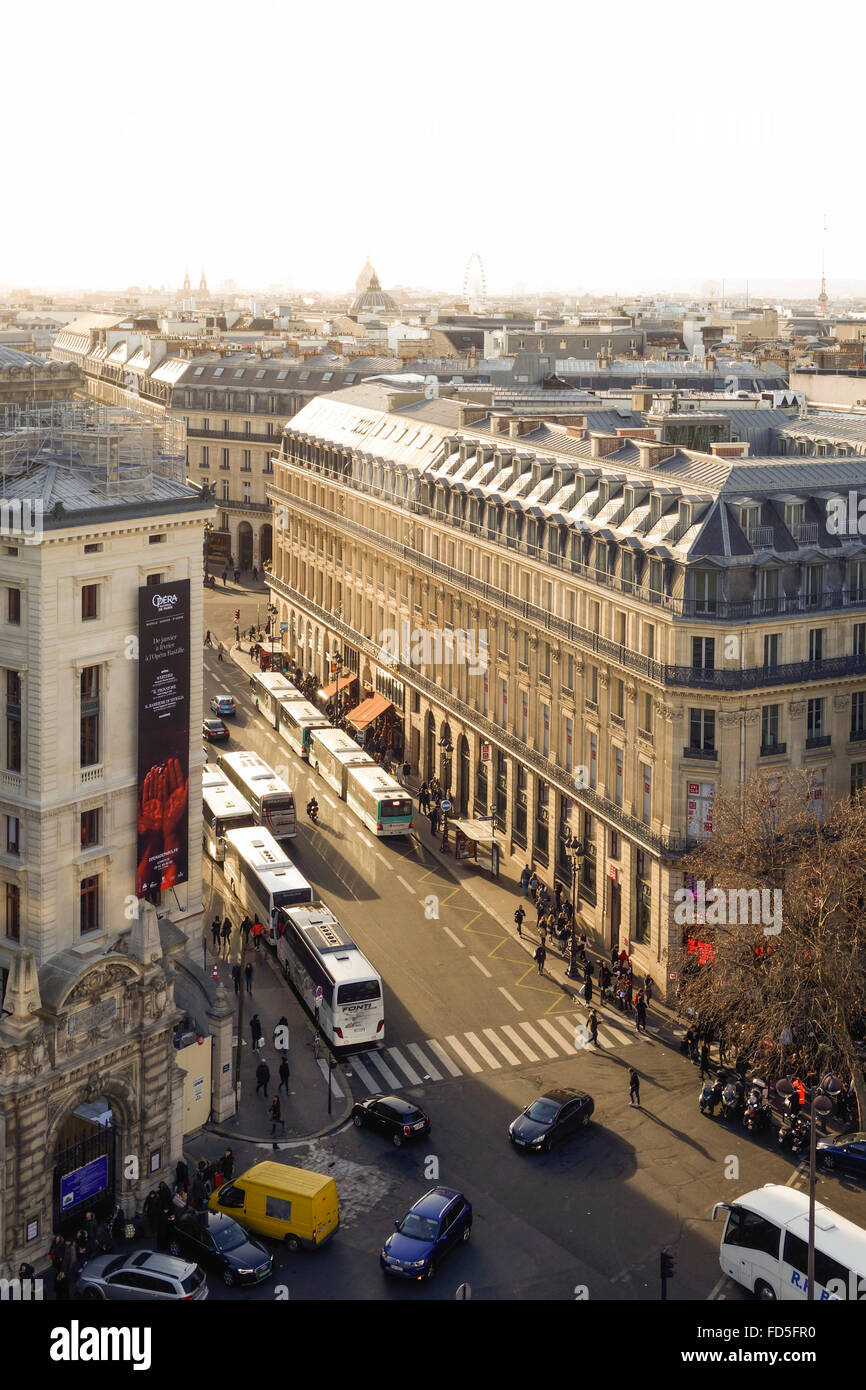 Traffic with Bus stop at Rue Scribe, opera of Paris, from roof terrace ...