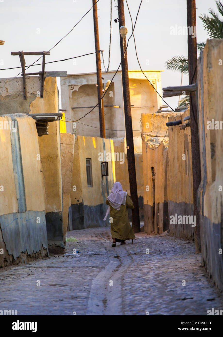 woman walking in the street, Qeshm Island, Laft, Iran Stock Photo - Alamy