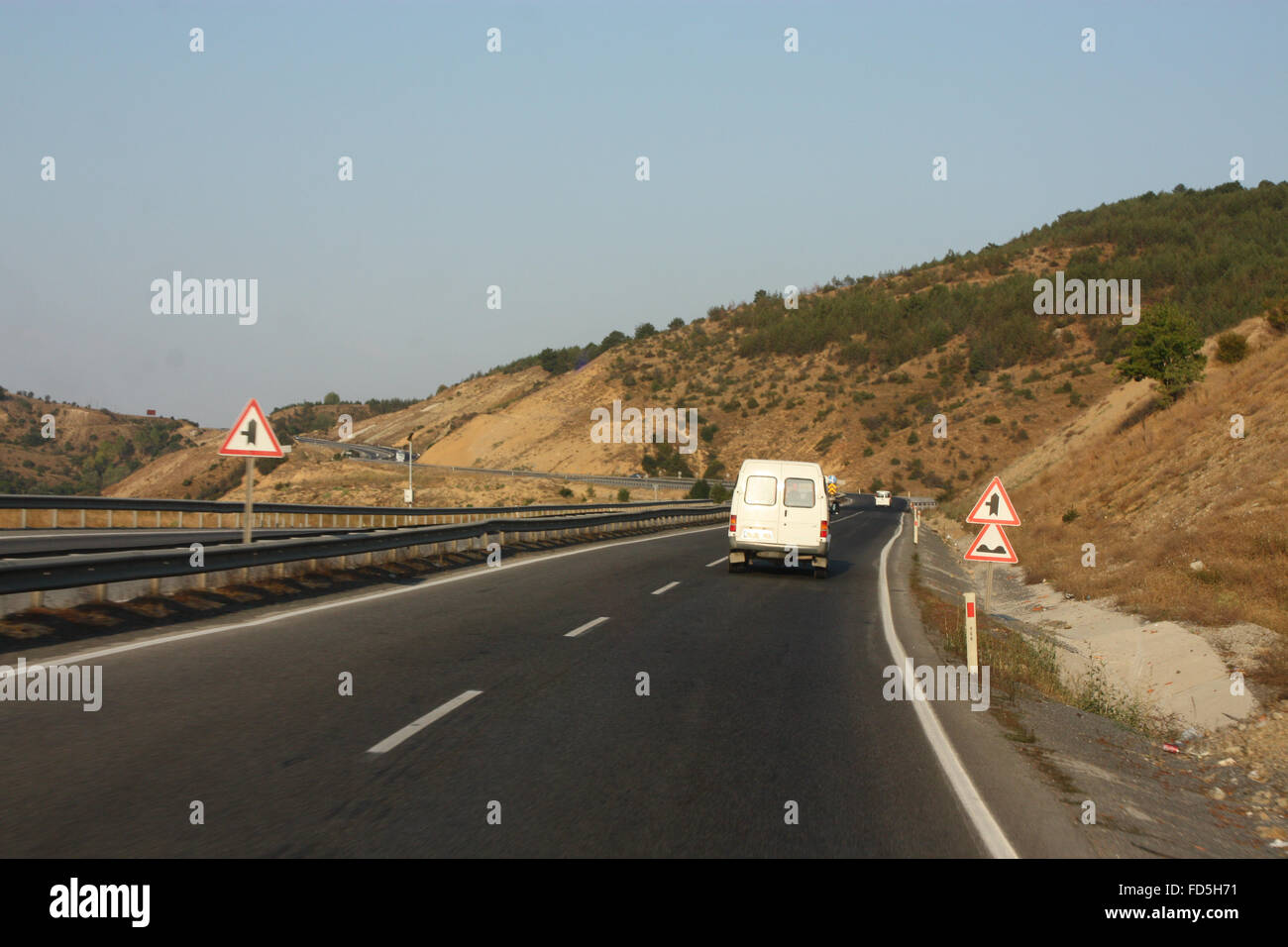 Car passing a road sign hi-res stock photography and images - Alamy