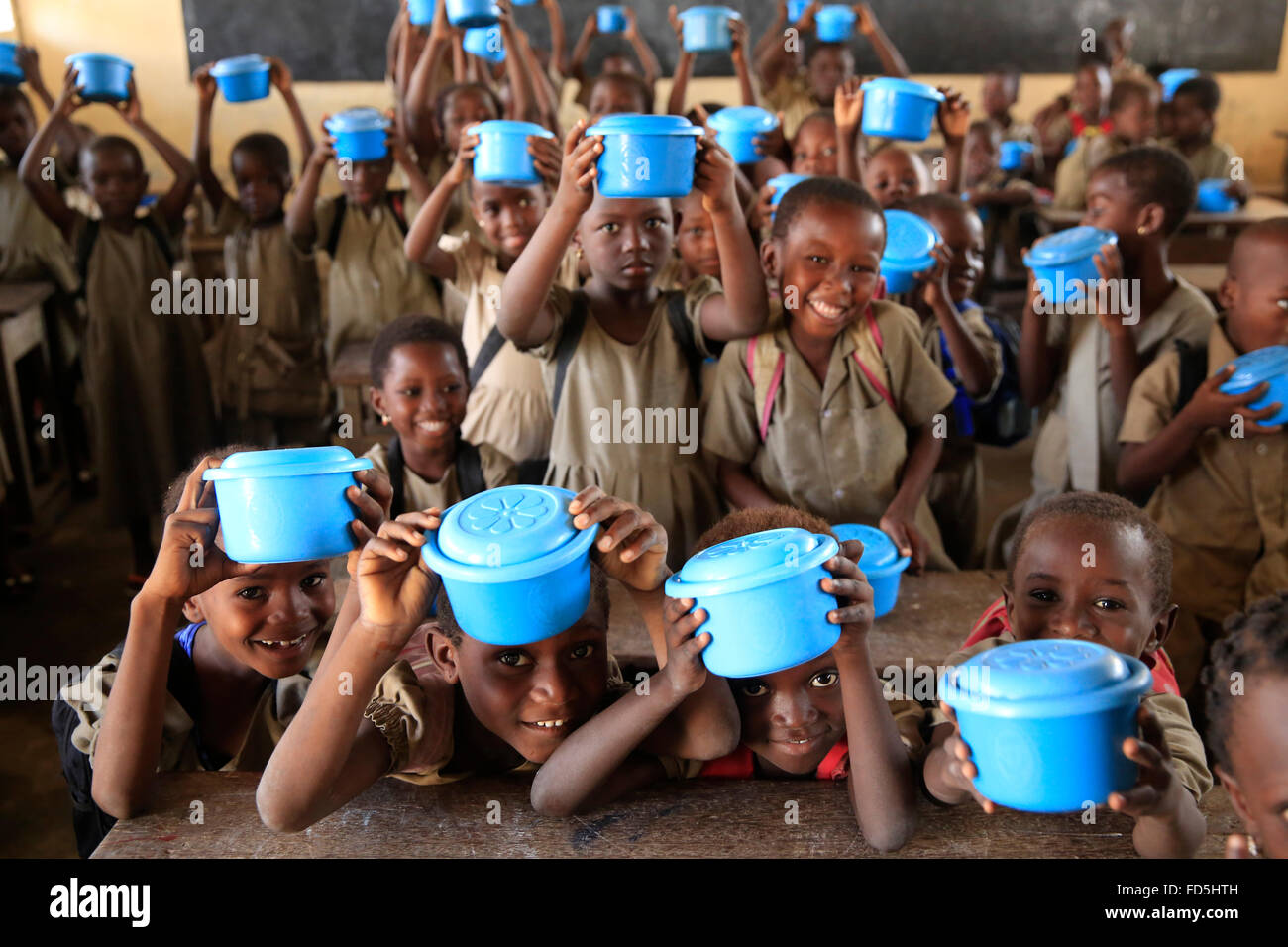 Food distribution in an African primary school Stock Photo - Alamy