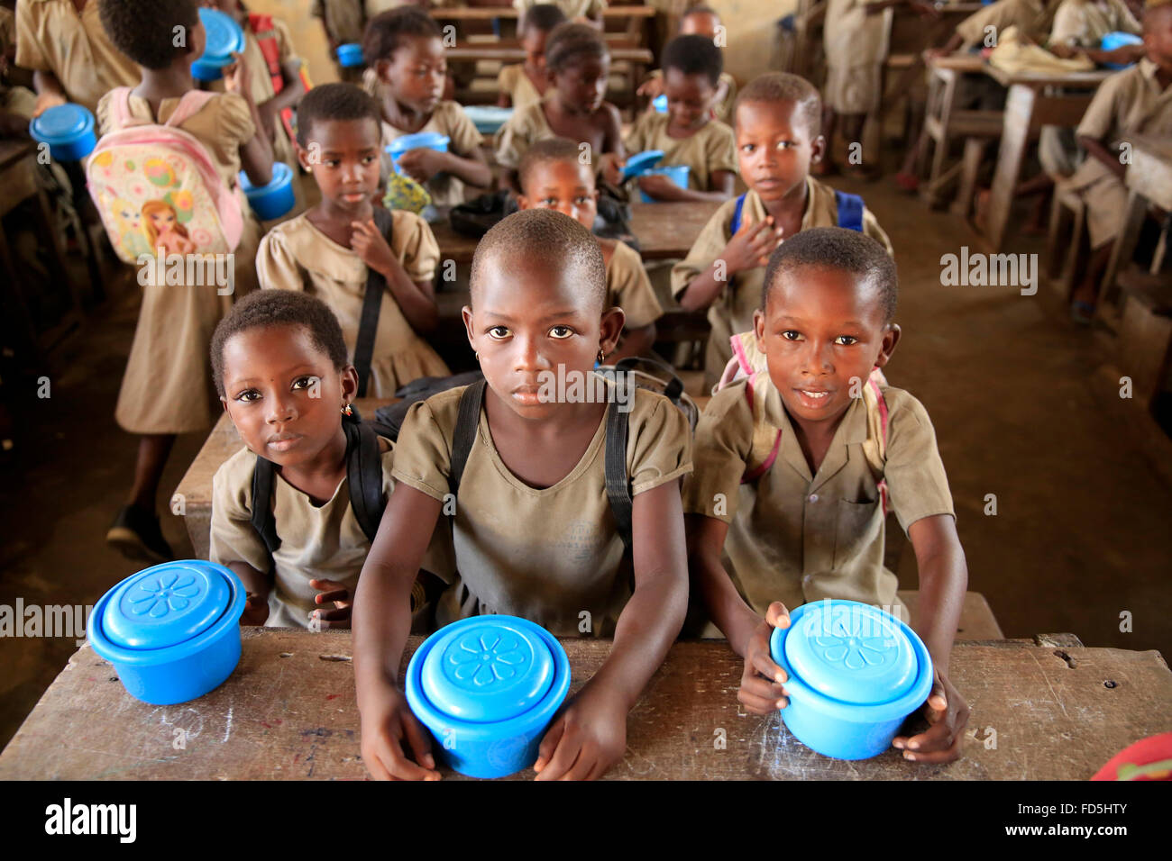 Food distribution in an African primary school Stock Photo - Alamy