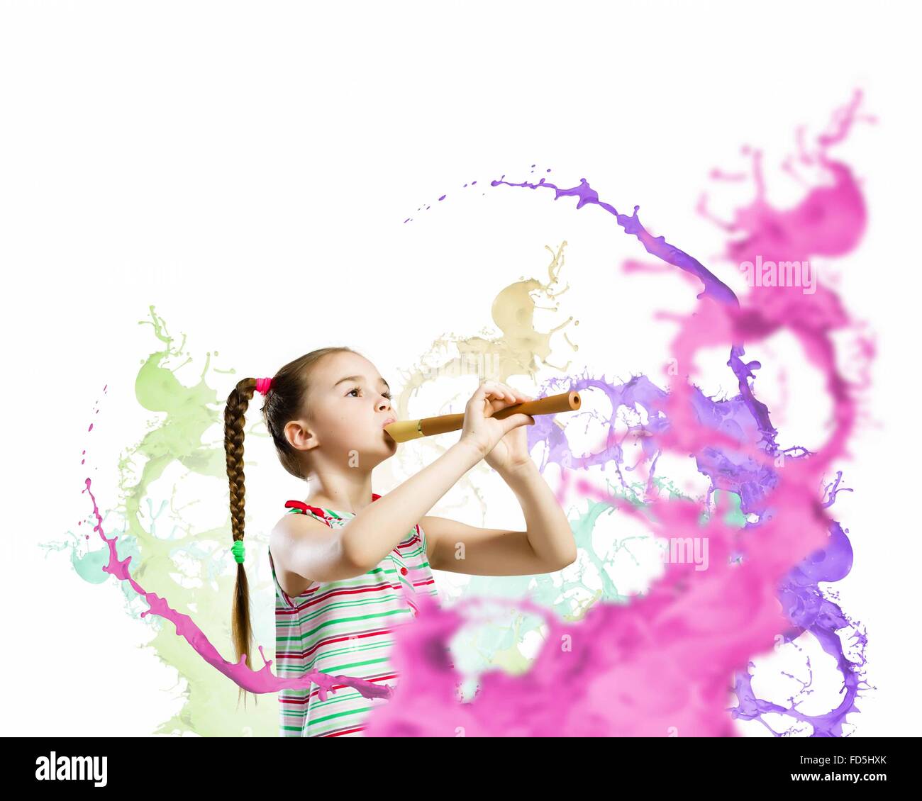Image of little cute girl playing on flute Stock Photo - Alamy