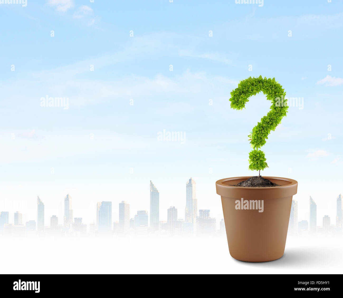 Image of plant pot with green question mark Stock Photo - Alamy