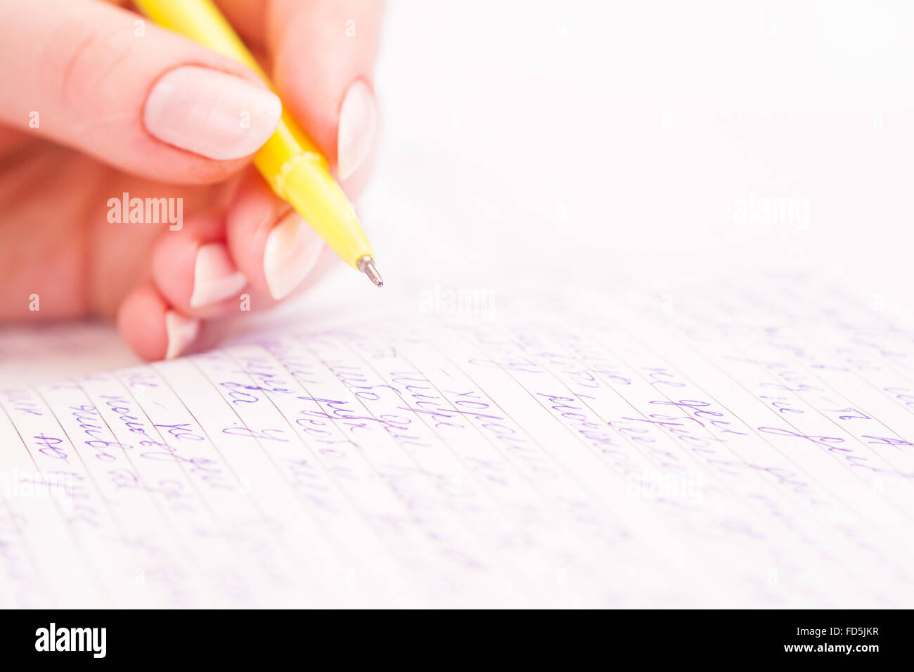 Business Woman Writing with pen in notepad Stock Photo - Alamy