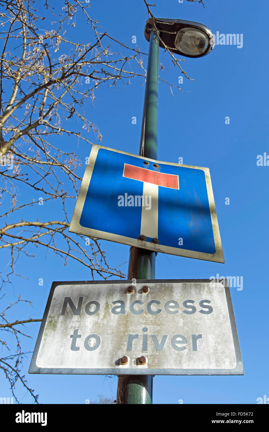 brtish road signs on lamppost indicating a no through road and stating ...