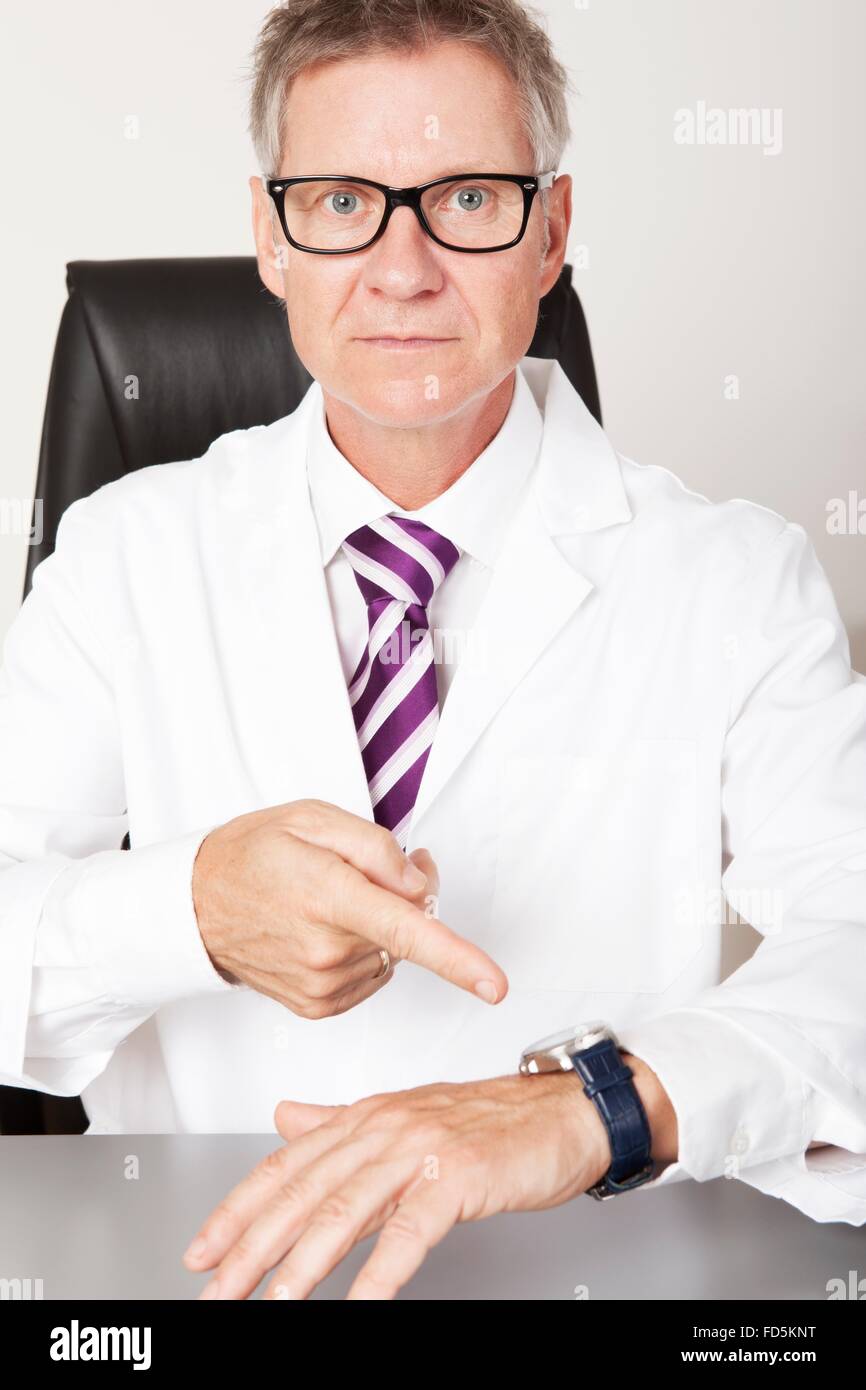 Checking watch uniform hi-res stock photography and images - Alamy