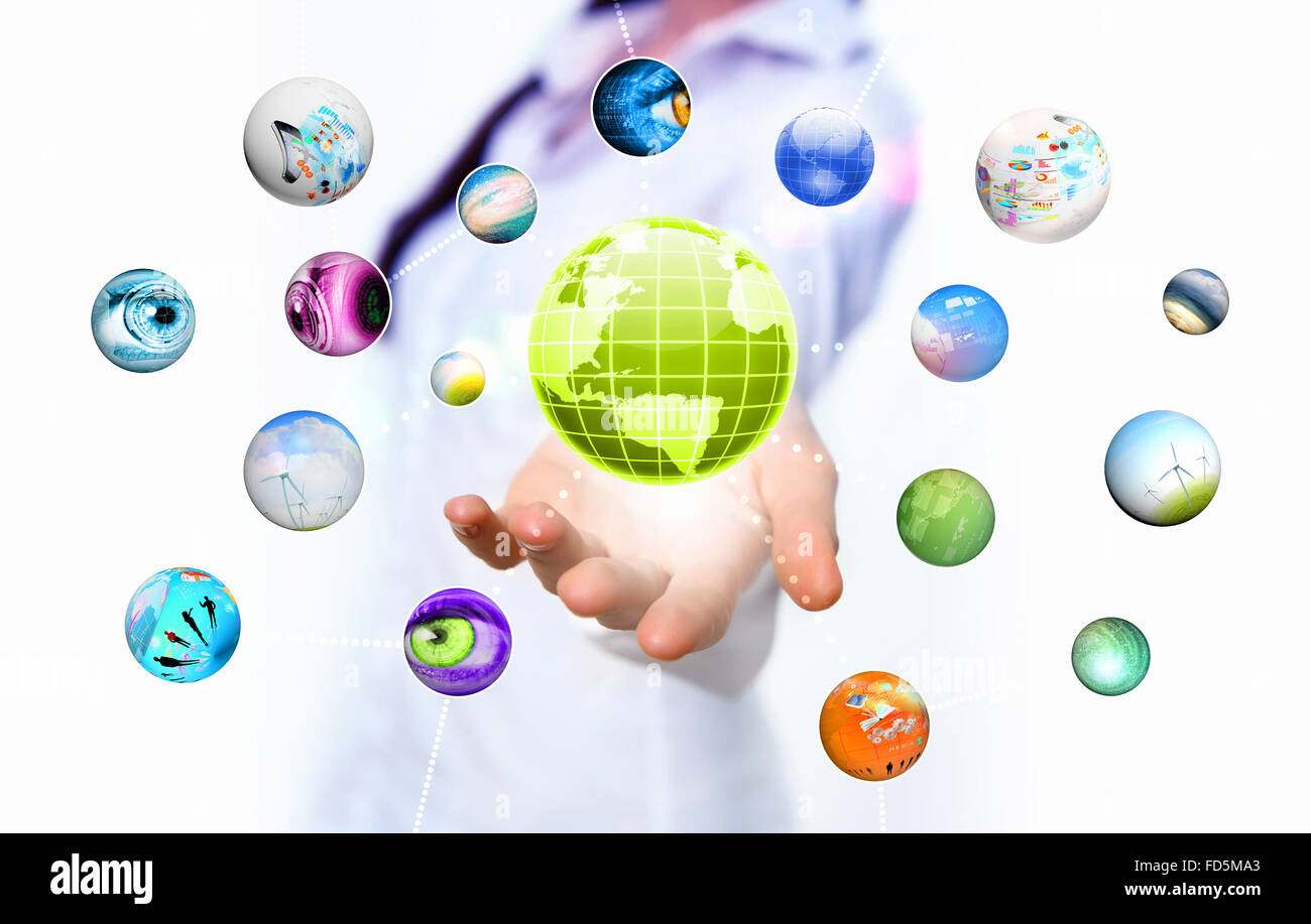 Items and icons on human hand. Global technologies Stock Photo - Alamy