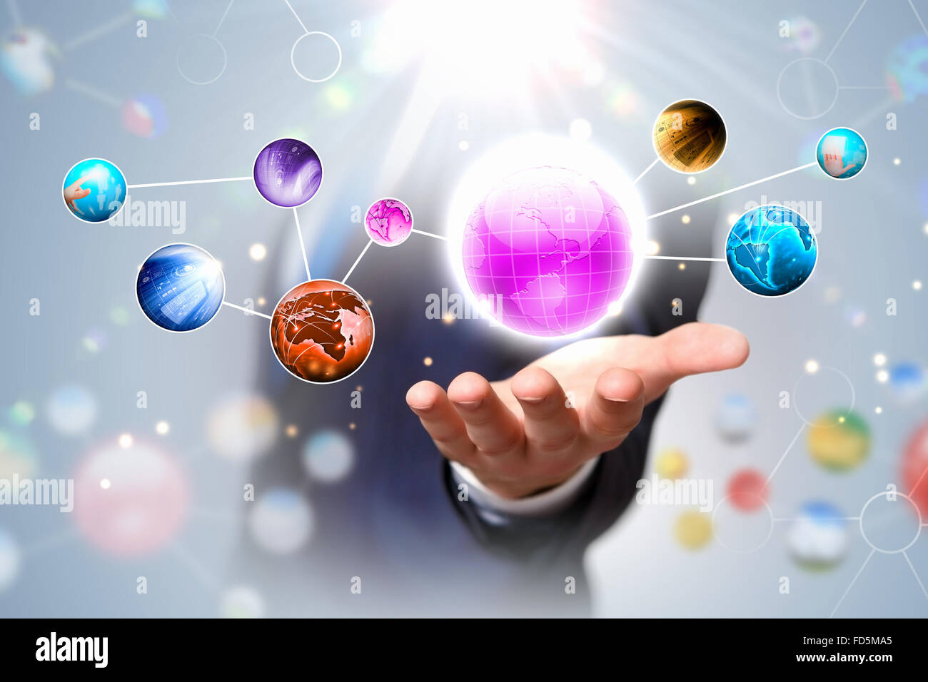 Items and icons on human hand. Global technologies Stock Photo - Alamy