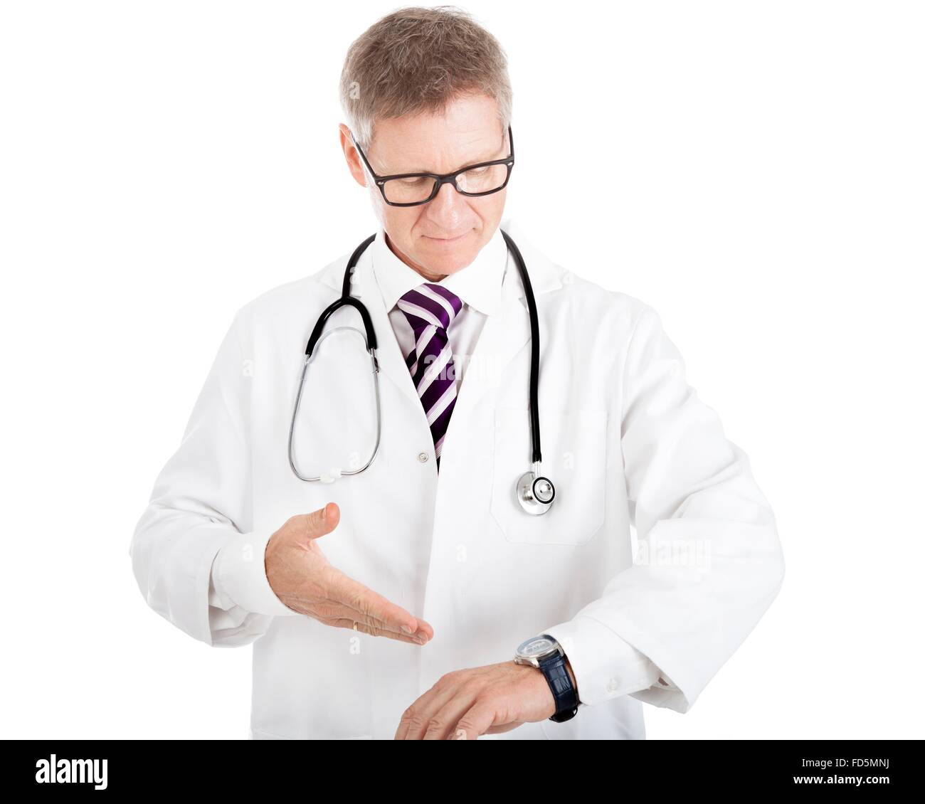 Middle-aged male doctor gesturing at his watch as he checks the time ...
