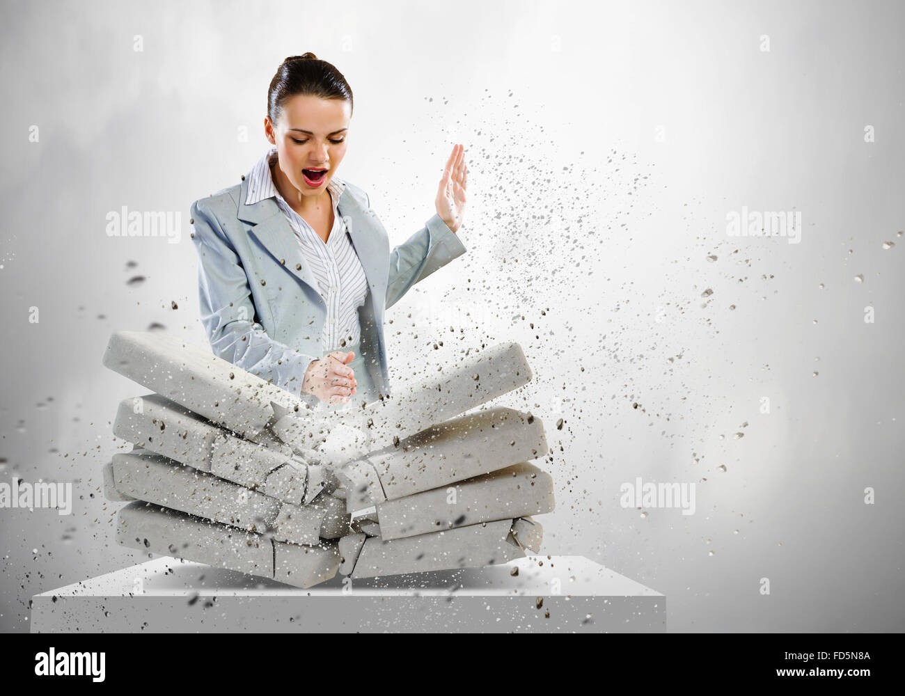 Woman breaking bricks hi-res stock photography and images - Alamy