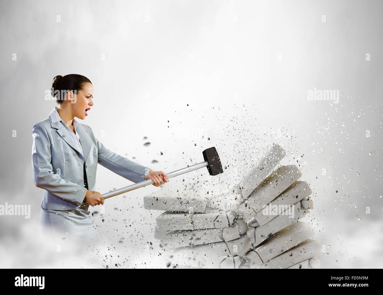 Woman breaking bricks hi-res stock photography and images - Alamy