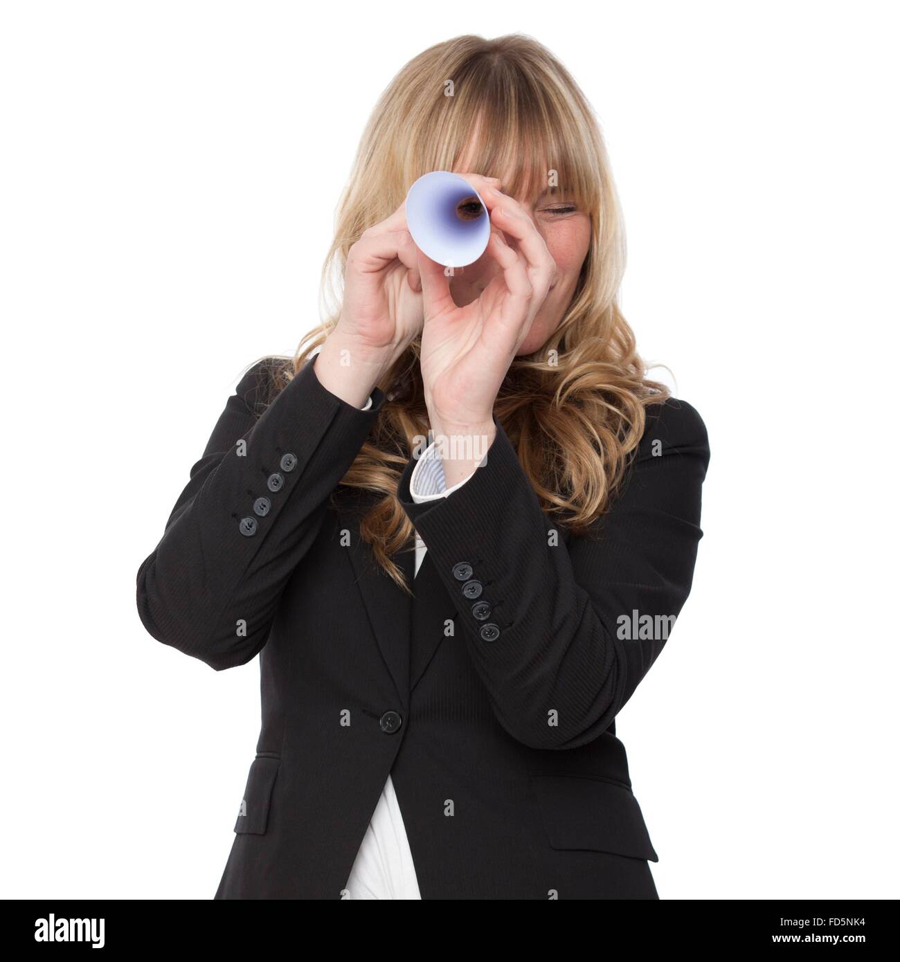 Woman looking through paper roll hi-res stock photography and images ...