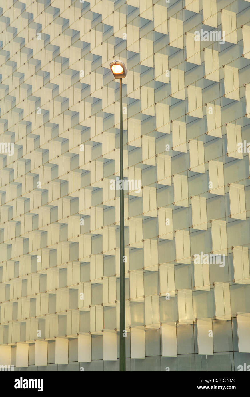 Modern building facade with street lamp. Vertical Stock Photo - Alamy