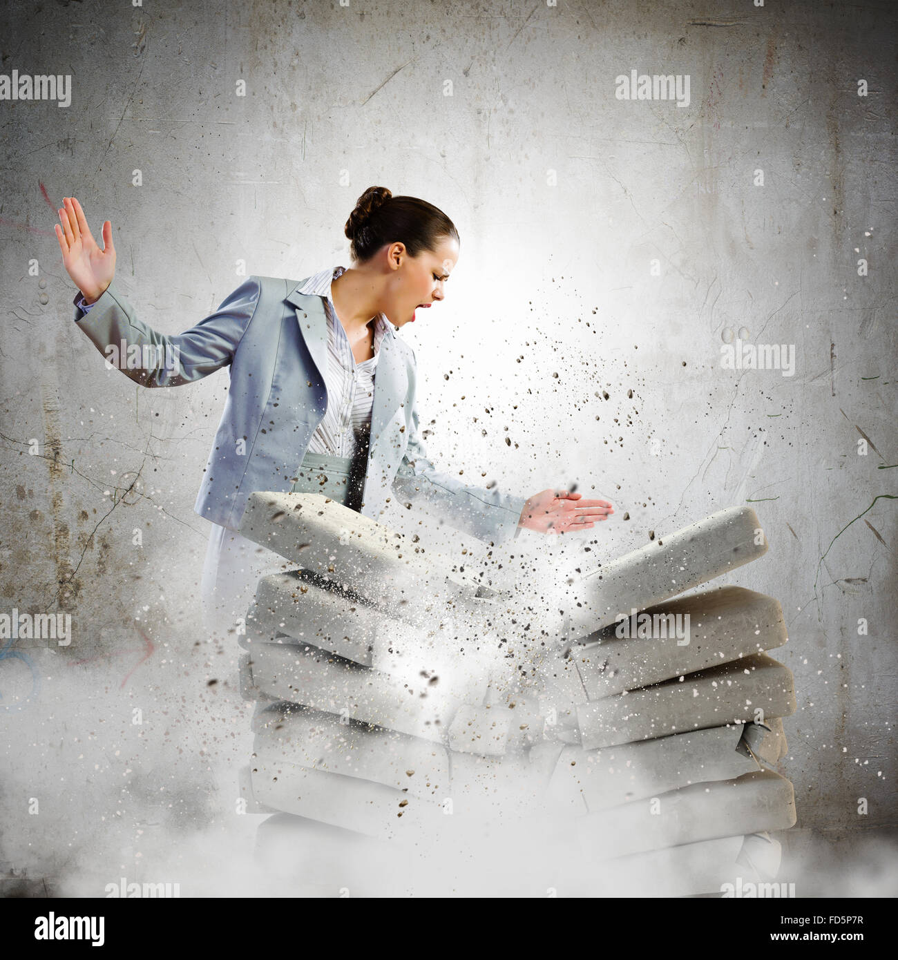 Woman breaking bricks hi-res stock photography and images - Alamy