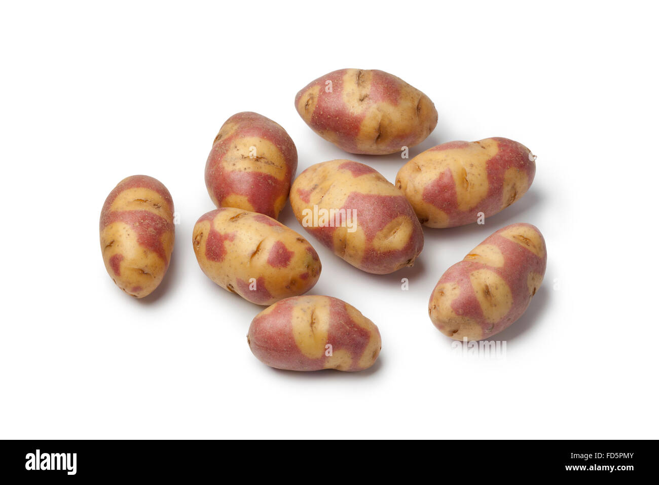 Fresh Mayan twilight potatoes on white background Stock Photo - Alamy