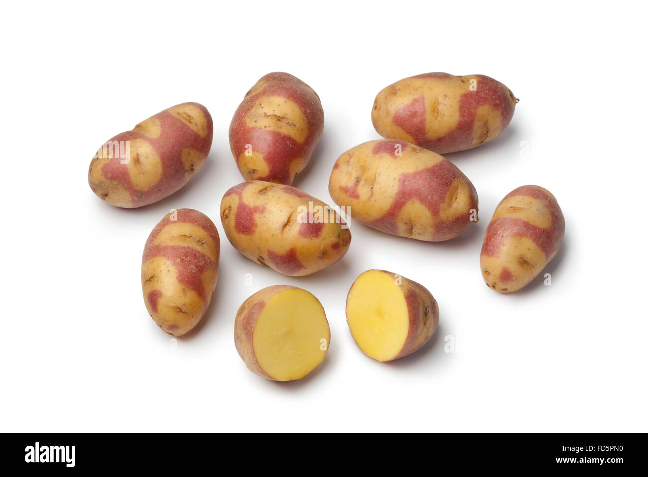 Fresh Mayan twilight potatoes on white background Stock Photo - Alamy