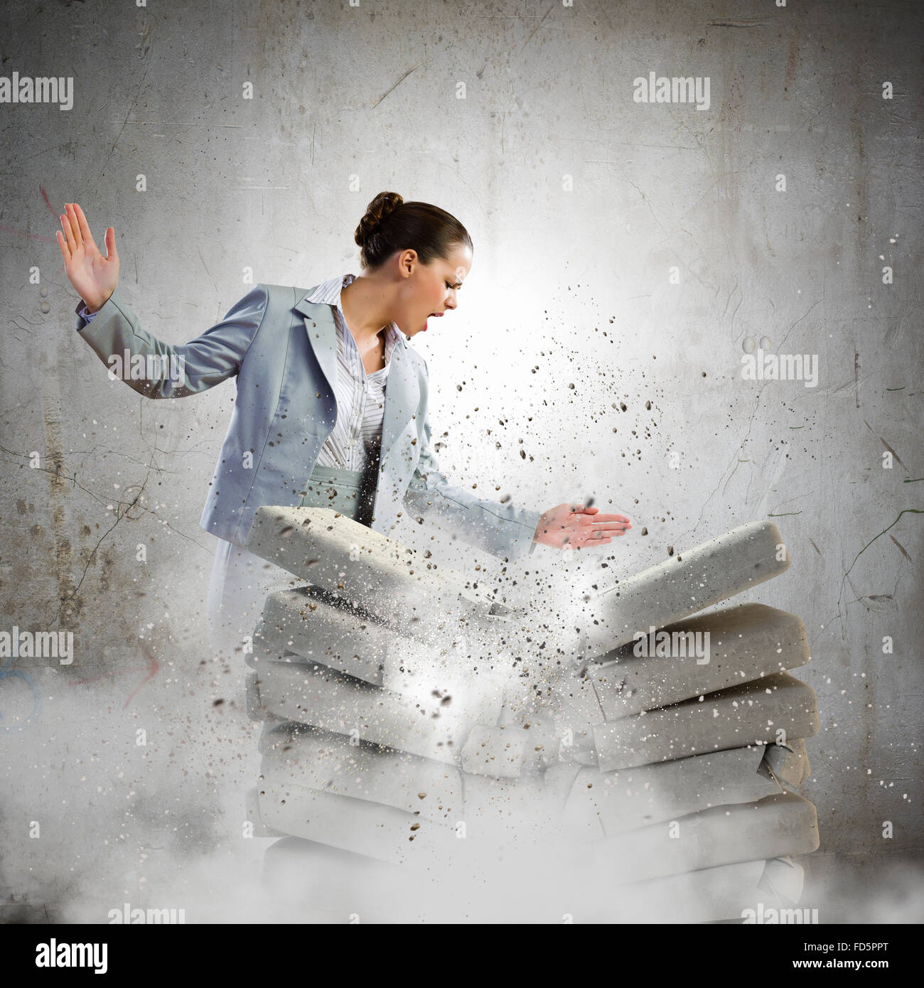 Woman breaking bricks hi-res stock photography and images - Alamy