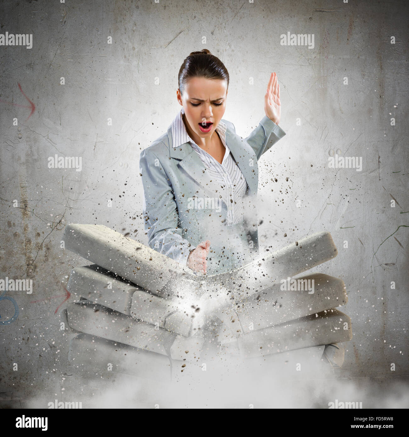Woman breaking bricks hi-res stock photography and images - Alamy