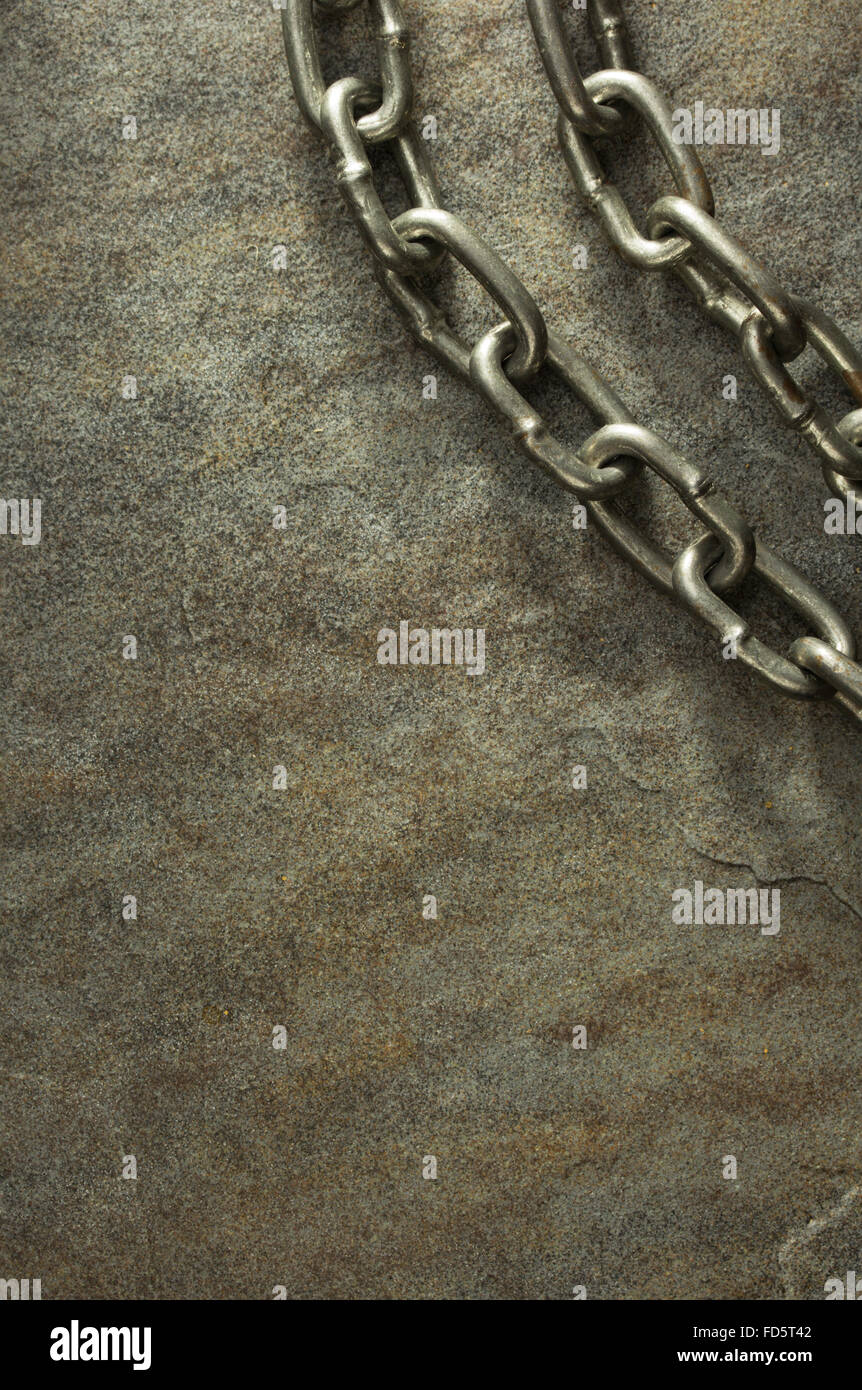 metal chain at stone background Stock Photo - Alamy