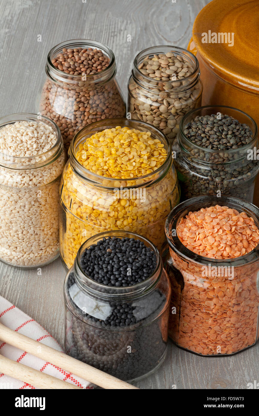 Variety of dried lentils in glass pots Stock Photo - Alamy