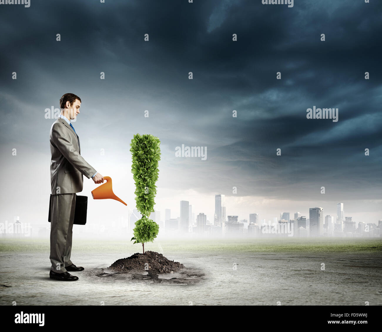Image of businessman watering plant shaped like exclamation mark Stock ...