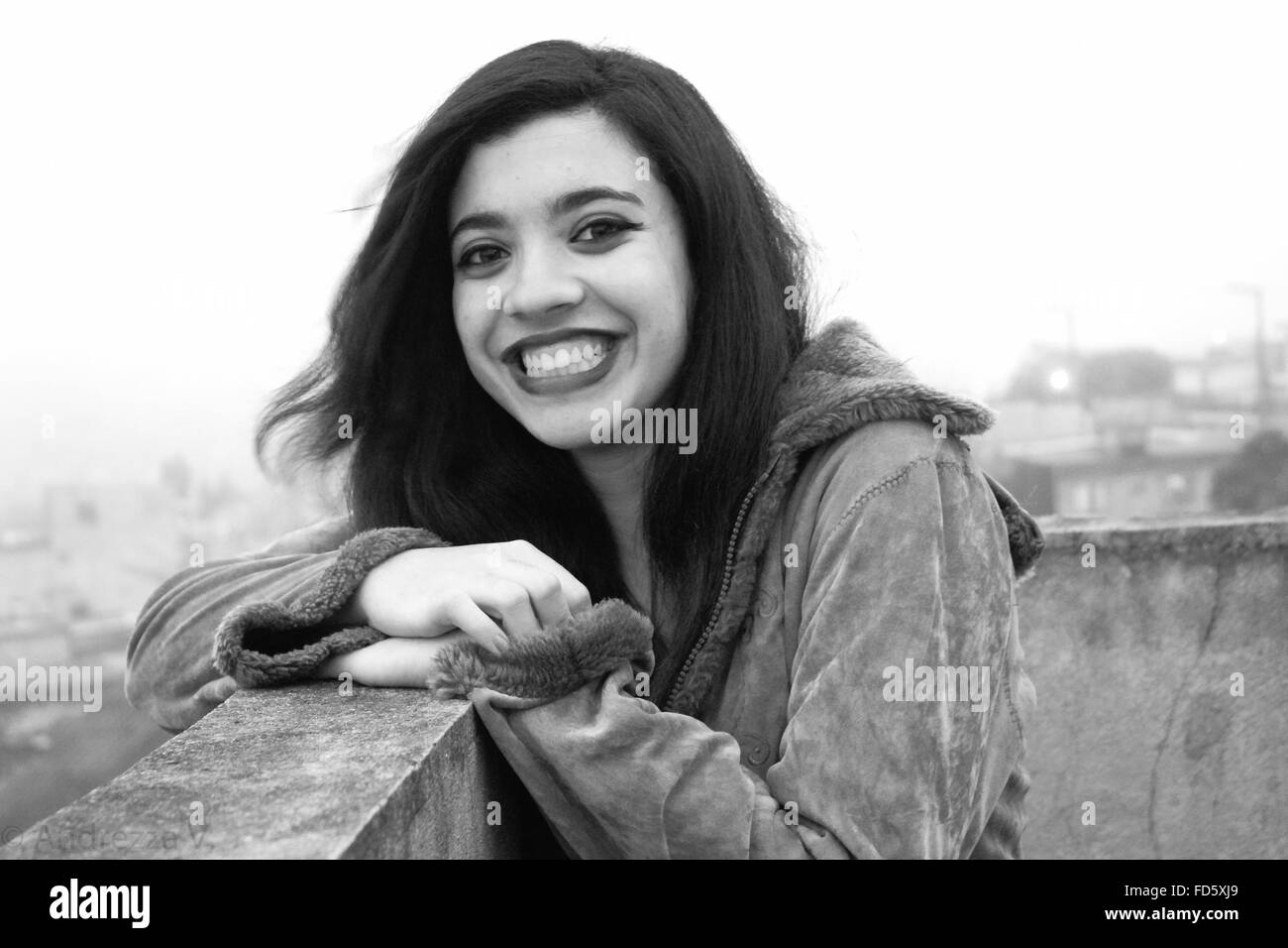 Portrait Of Young Woman On Roof Stock Photo - Alamy