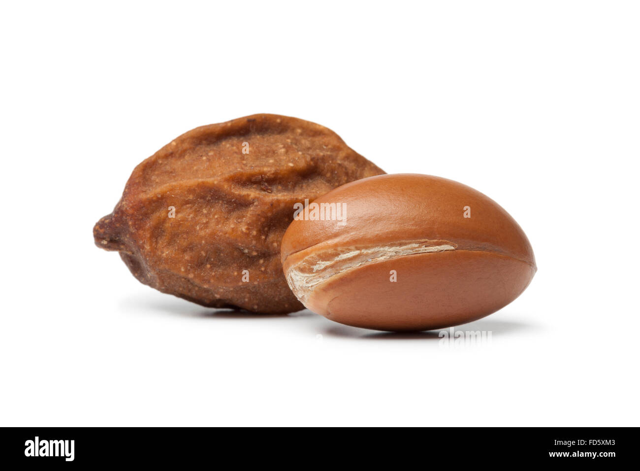Whole Moroccan Argan nuts on white background Stock Photo - Alamy