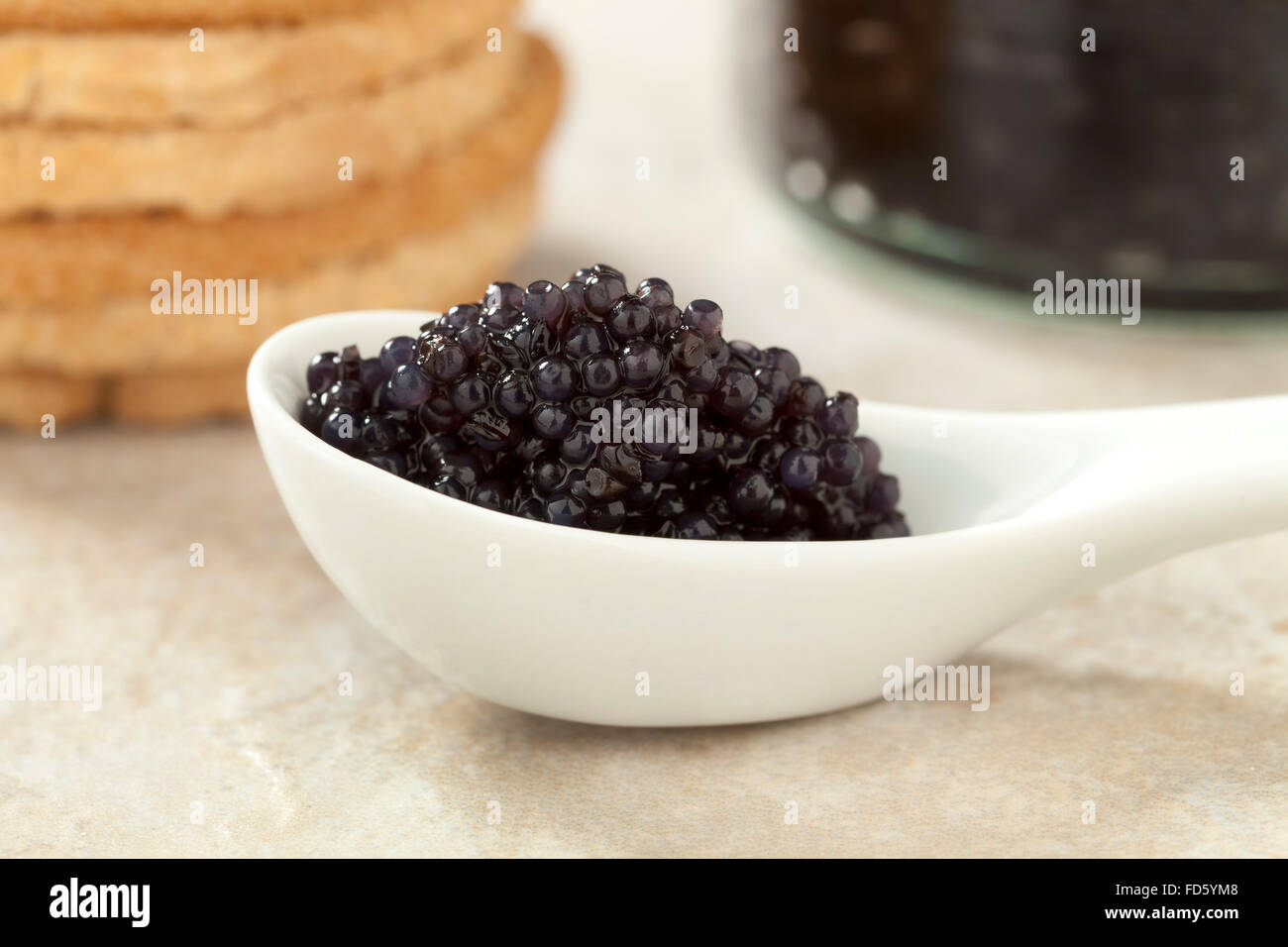 Lumpfish roe on a white spoon Stock Photo - Alamy