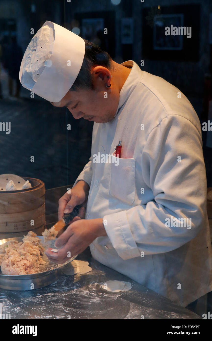 Chinese cook in a Chinatown restaurant, London Stock Photo - Alamy
