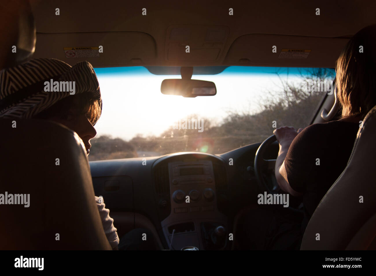 Two people driving car hi-res stock photography and images - Alamy