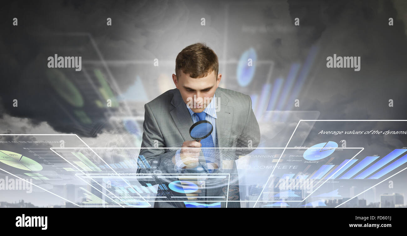 Image of businessman examining objects with magnifier Stock Photo - Alamy