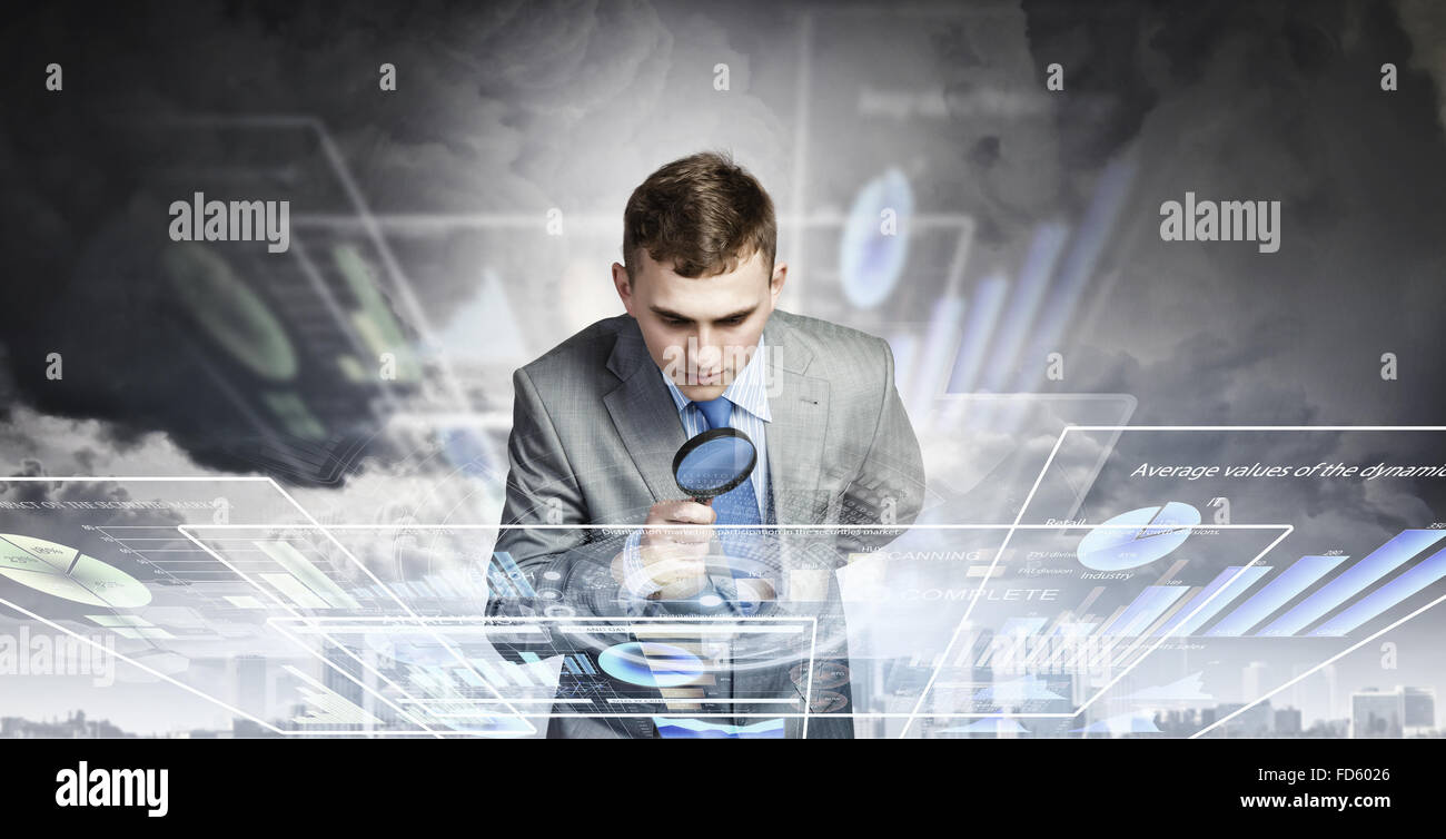 Image of businessman examining objects with magnifier Stock Photo - Alamy