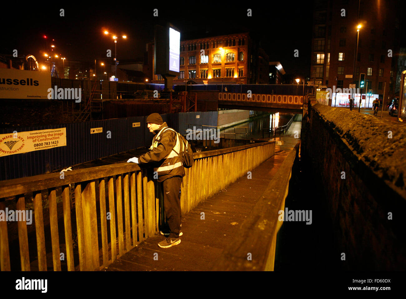 A members of the manchester street angels checks the canal for anyone ...