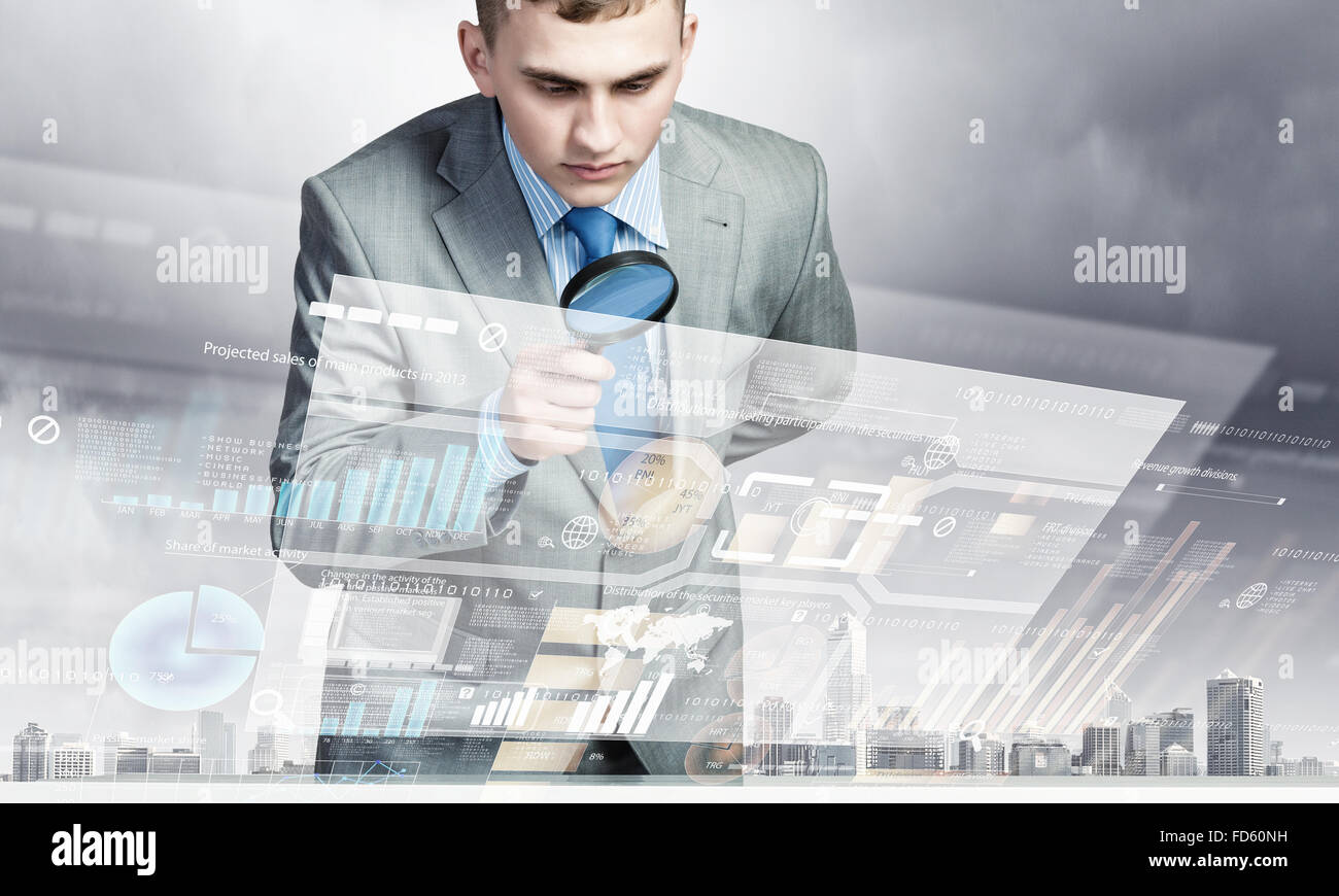 Image of businessman examining objects with magnifier Stock Photo - Alamy