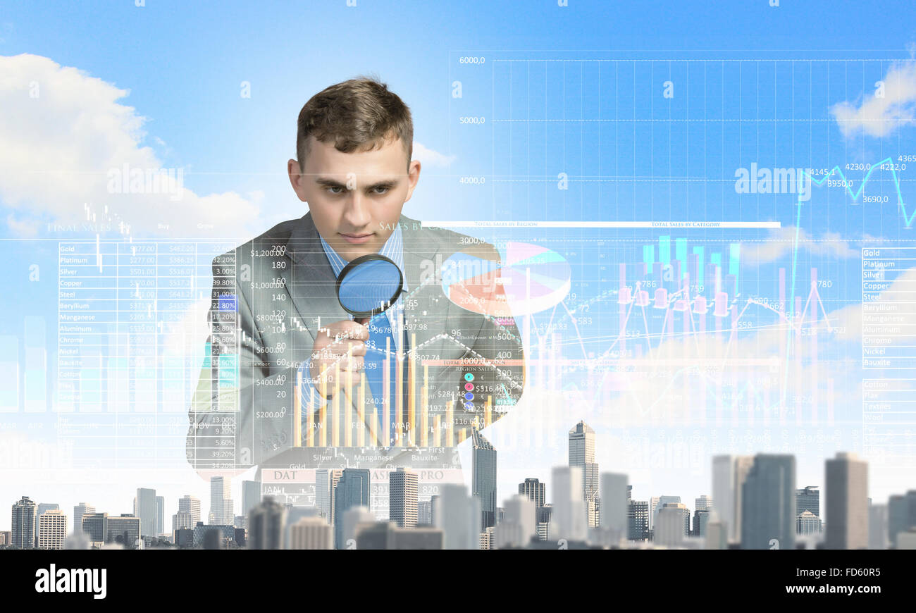 Image of businessman examining objects with magnifier Stock Photo - Alamy