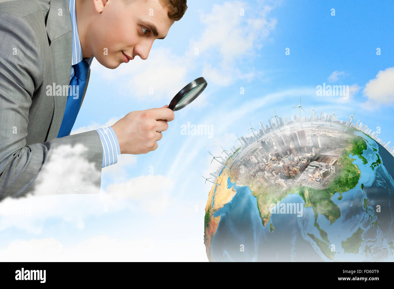 Image of businessman examining objects with magnifier. Elements of this ...