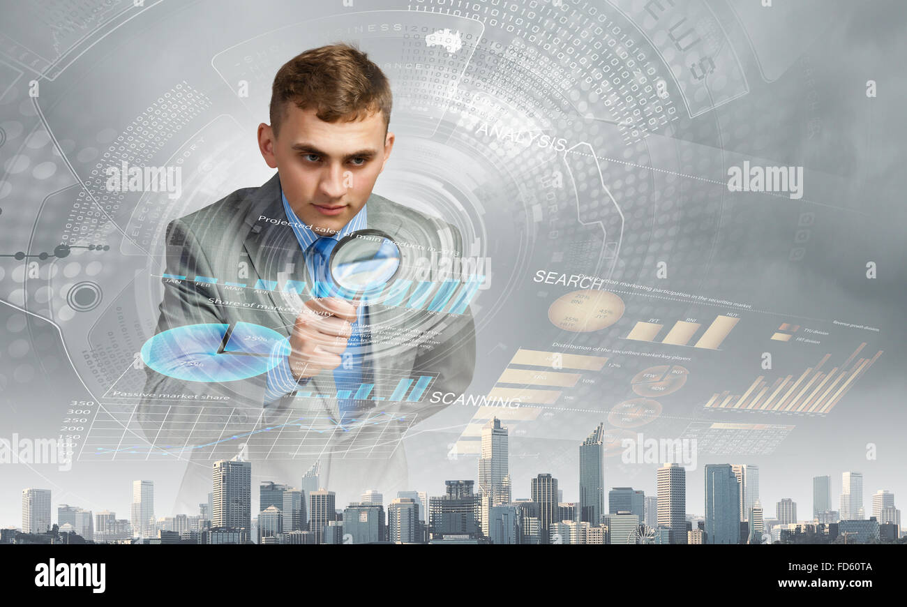 Image of businessman examining objects with magnifier Stock Photo - Alamy