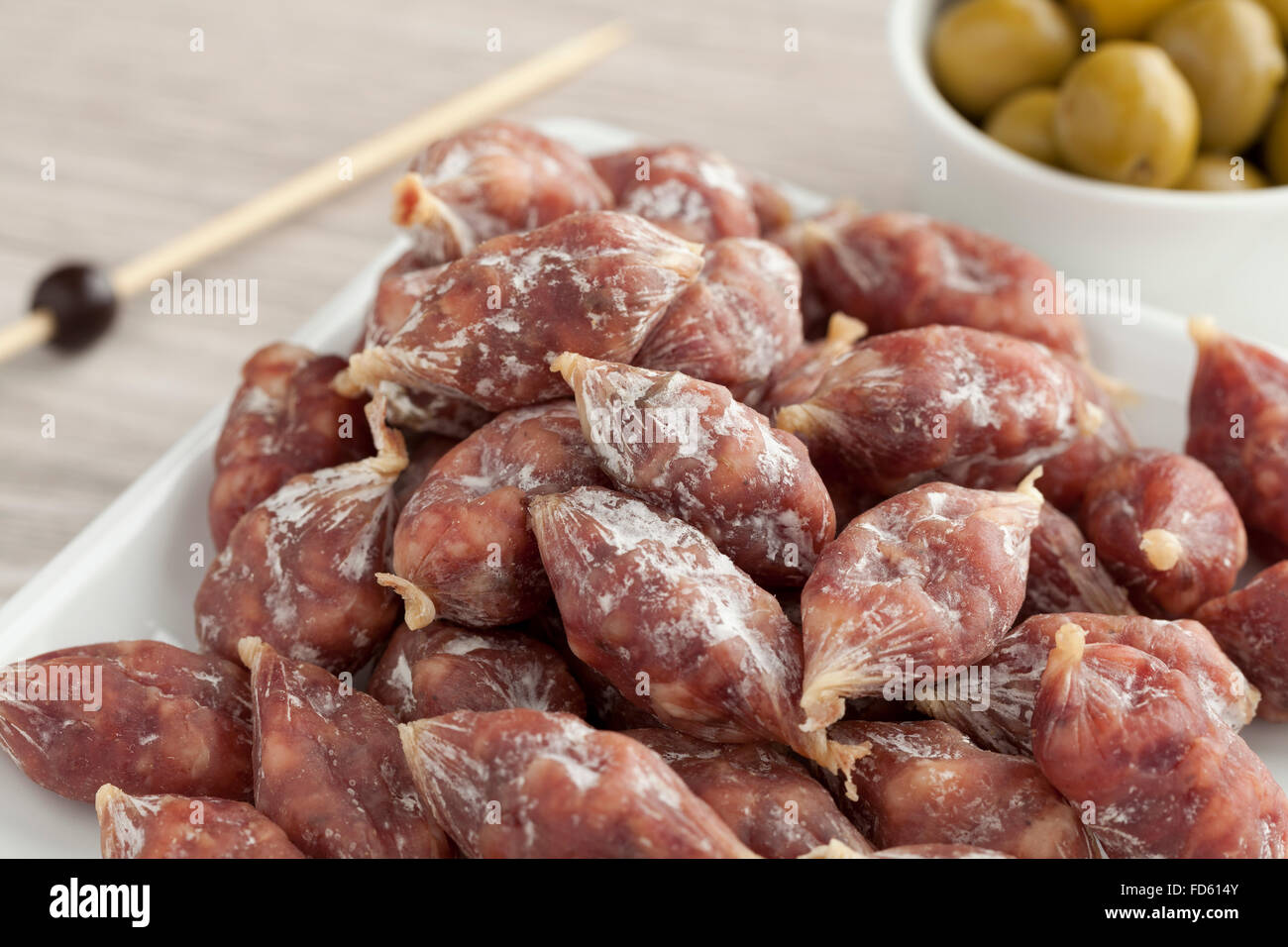 French dry mini saucissons Stock Photo - Alamy